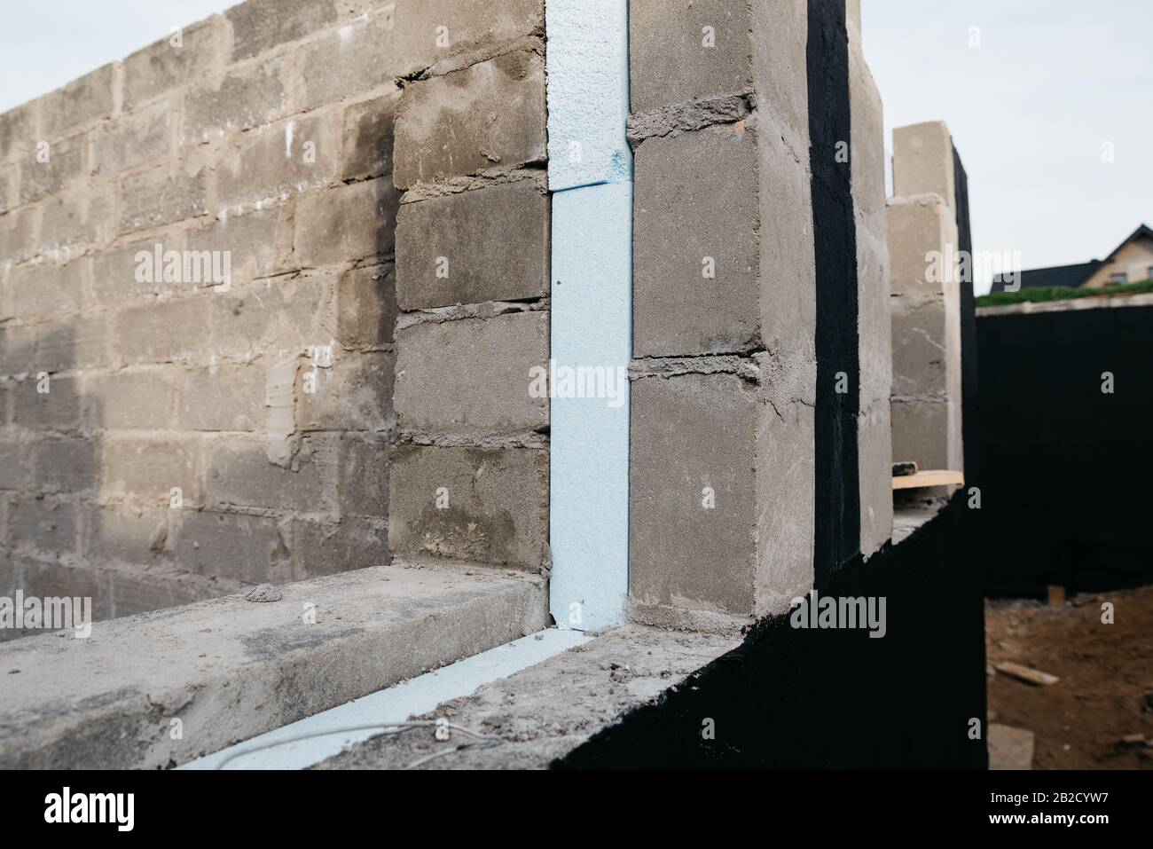 construction of a three-layer wall with insulation Stock Photo - Alamy