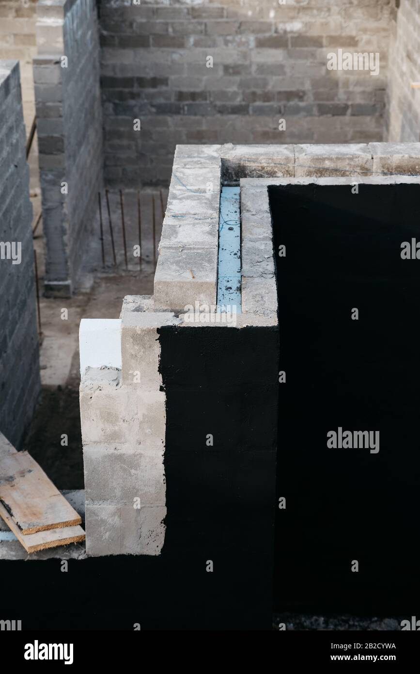 construction of a three-layer wall with insulation Stock Photo - Alamy