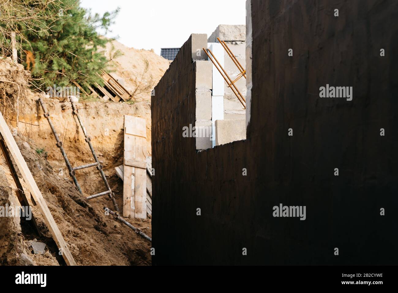 construction of a three-layer wall with insulation Stock Photo - Alamy