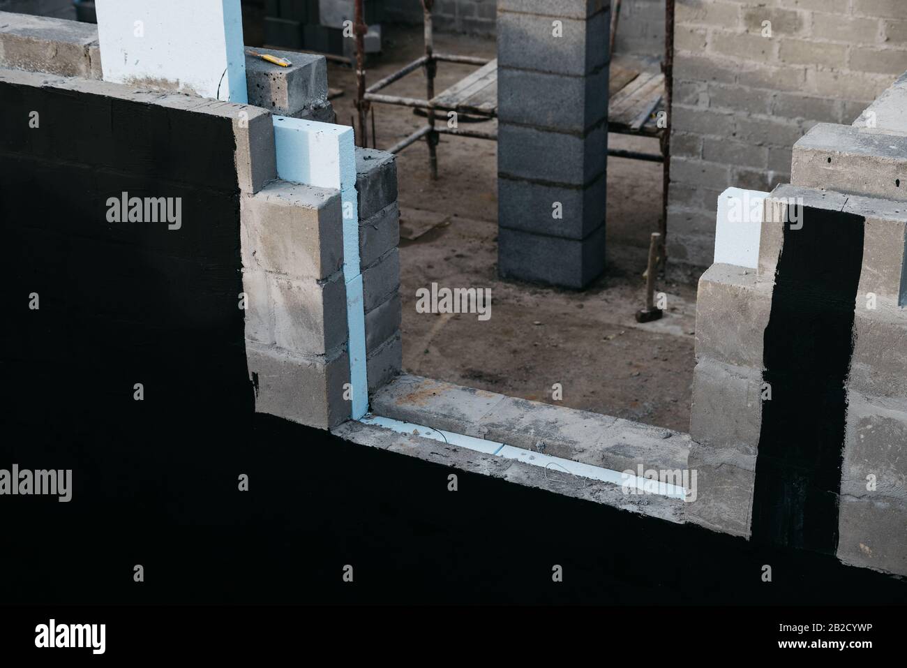 construction of a three-layer wall with insulation Stock Photo - Alamy