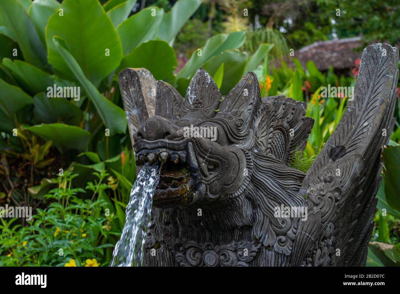 Statue at the Tirta Gangga palace in Bali Indonesia Stock Photo - Alamy