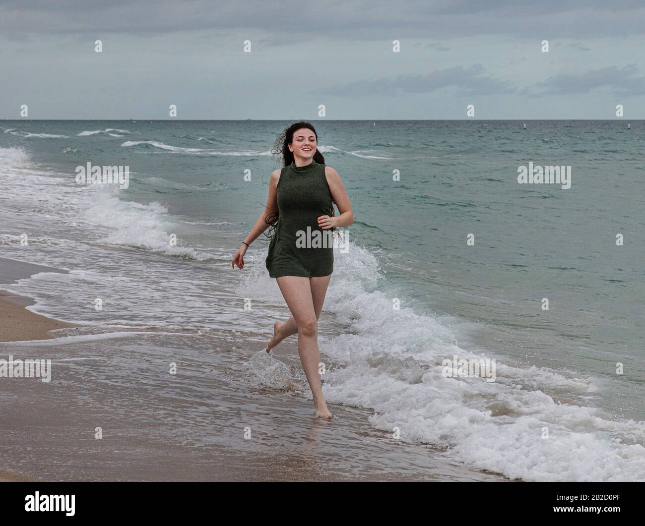 Woman twirling at sunset hi-res stock photography and images - Alamy