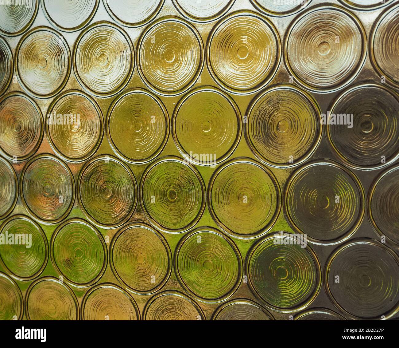 yellow decorated glass texture useful as a background Stock Photo - Alamy
