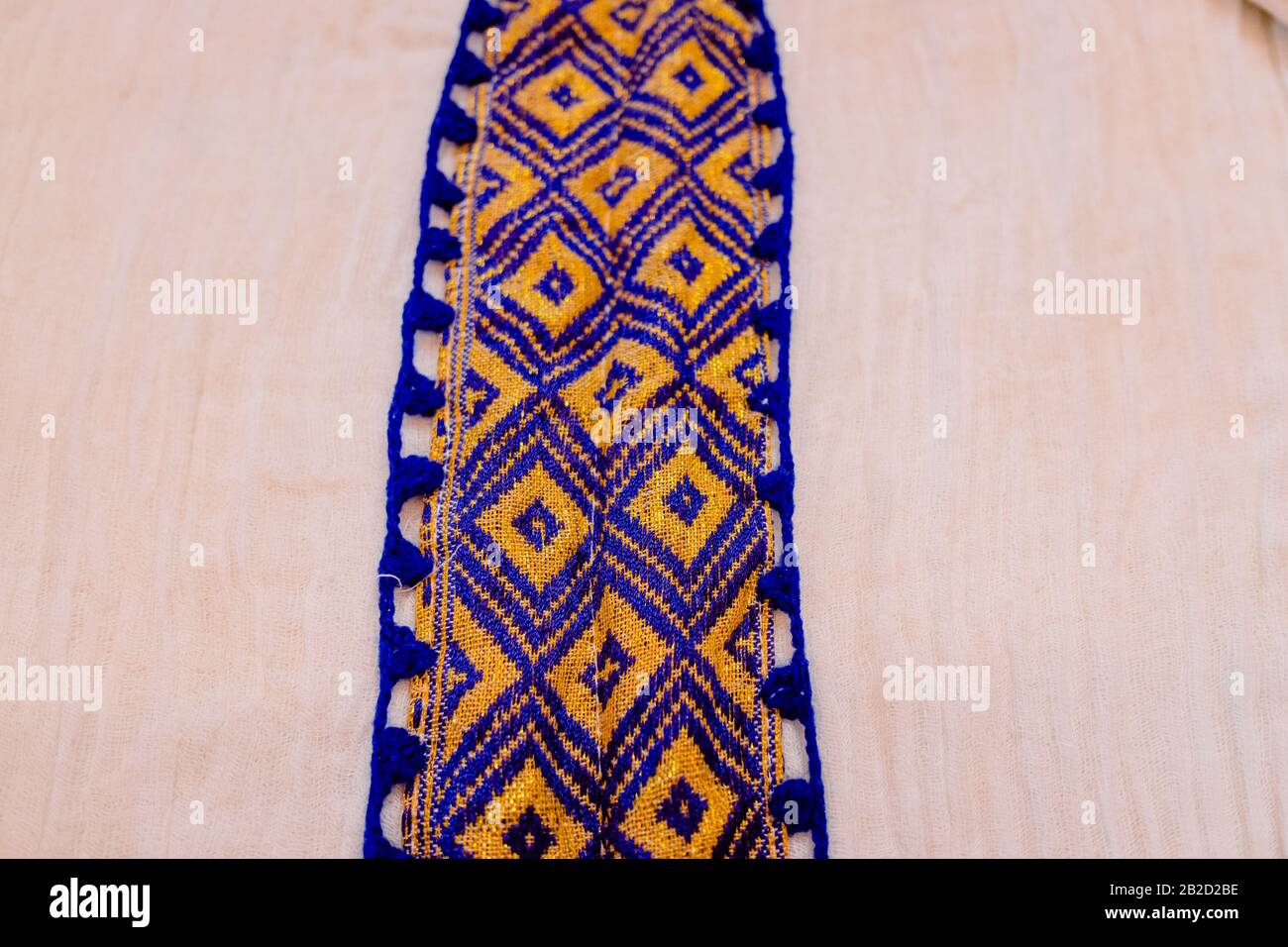 Traditional embroidery detail of an African Ethiopian dress fabric ...