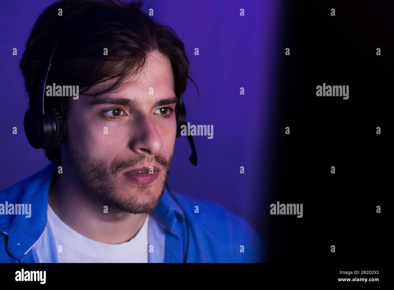 Student Playing Game Sitting In Front Of Computer At Home Stock Photo ...