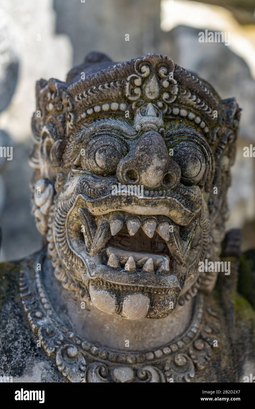 Ancient Balinese statue at the temple in Bali Indonesia Stock Photo - Alamy
