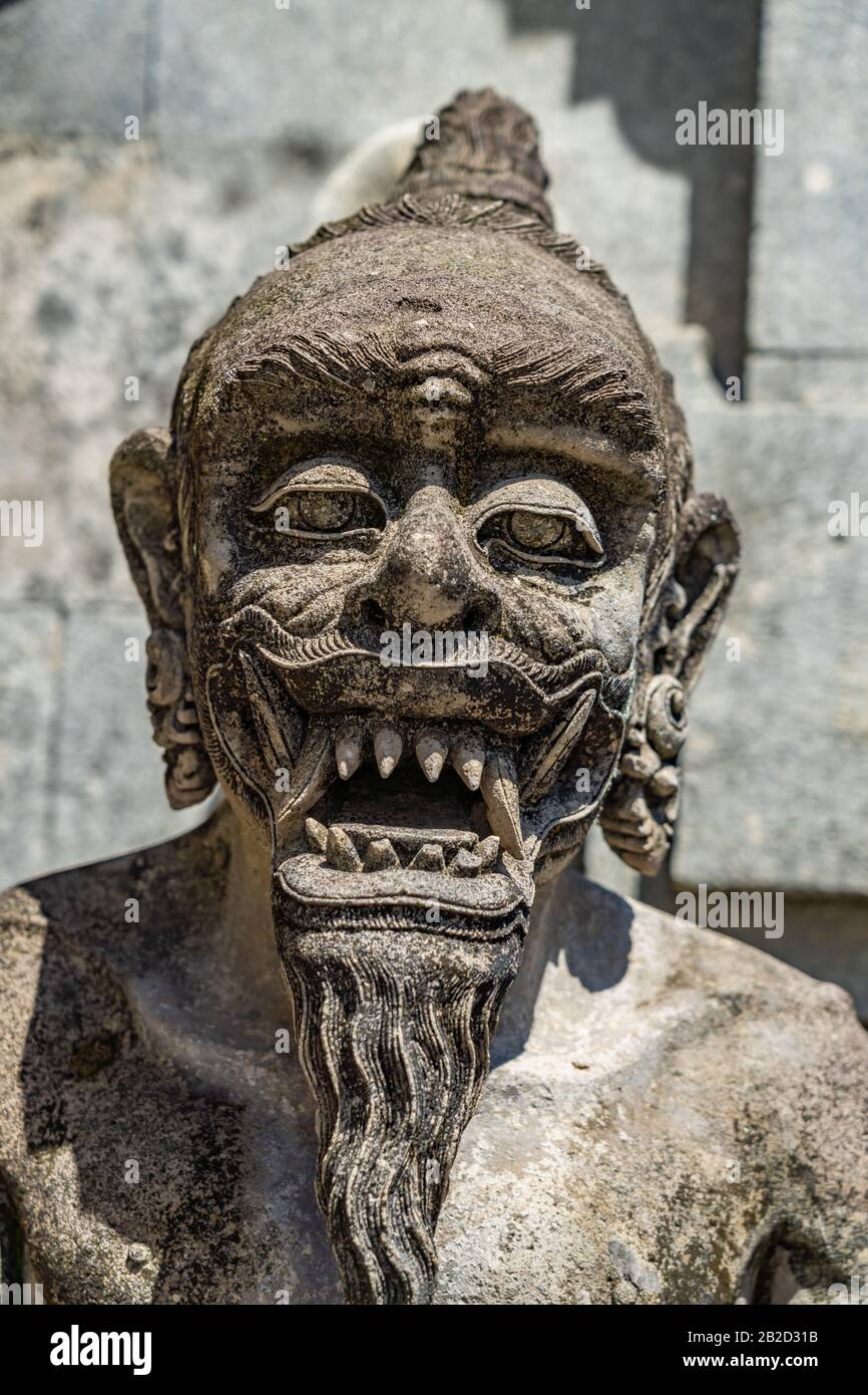 Ancient Balinese statue at the temple in Bali Indonesia Stock Photo - Alamy