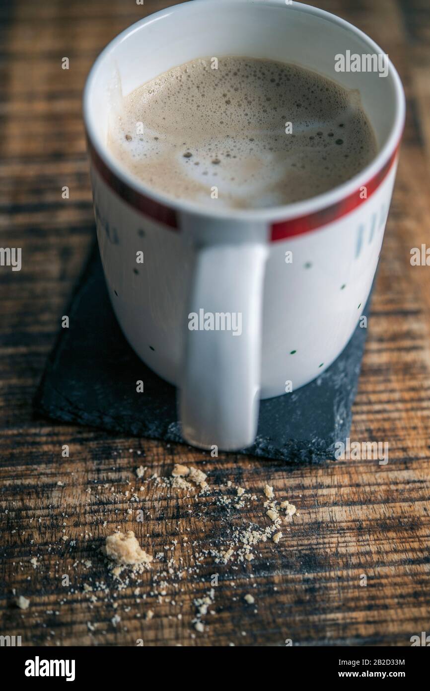 Mug milky coffee biscuit hi-res stock photography and images - Alamy