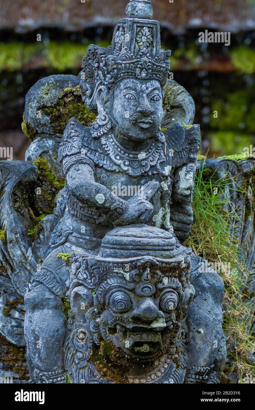 Statue at the Tirta Gangga palace in Bali Indonesia Stock Photo - Alamy
