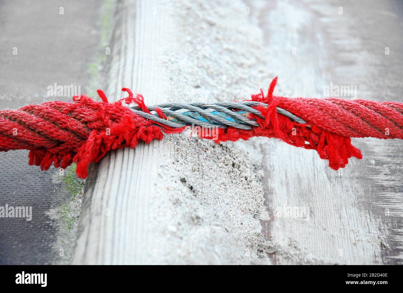 Red rope detail with broken textile material Stock Photo - Alamy