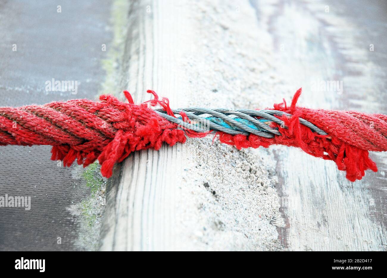 Red rope with material error, risk, playground, symbol Stock Photo - Alamy