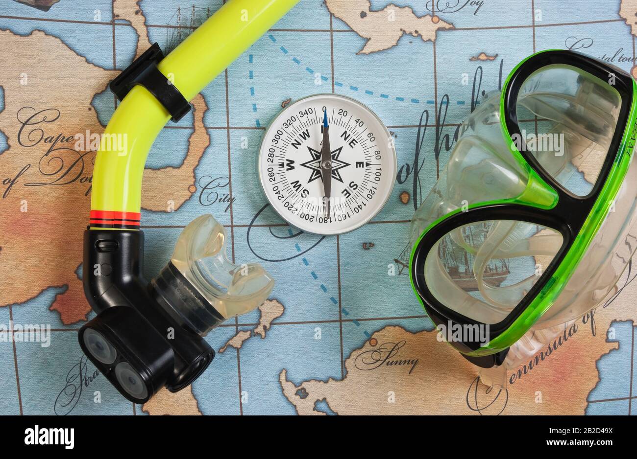 mask and snorkel diving on the map Stock Photo - Alamy