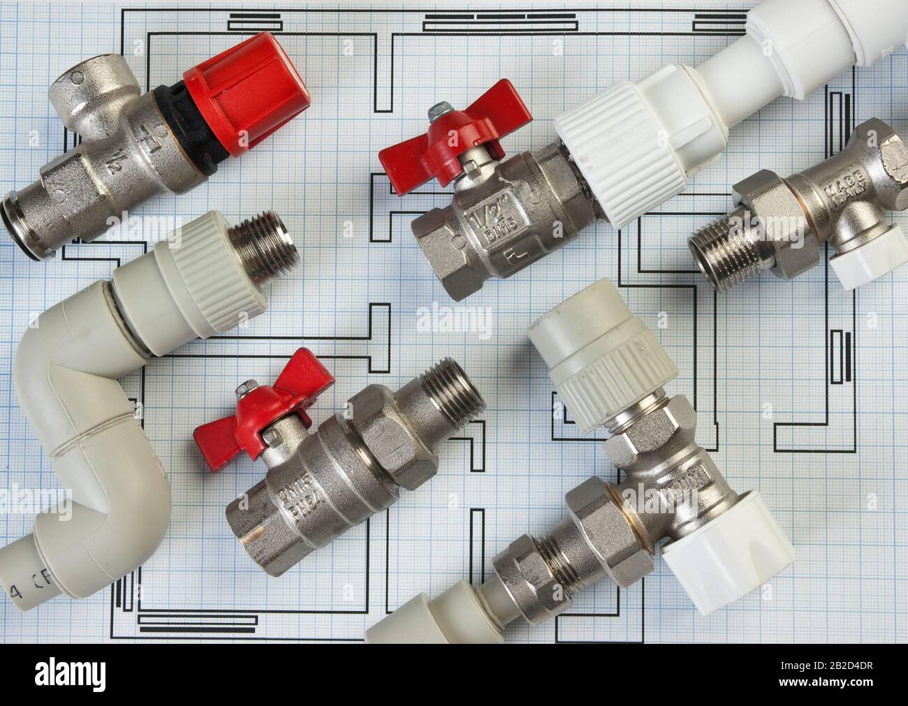 Set plumbing fittings on the drawing Stock Photo - Alamy