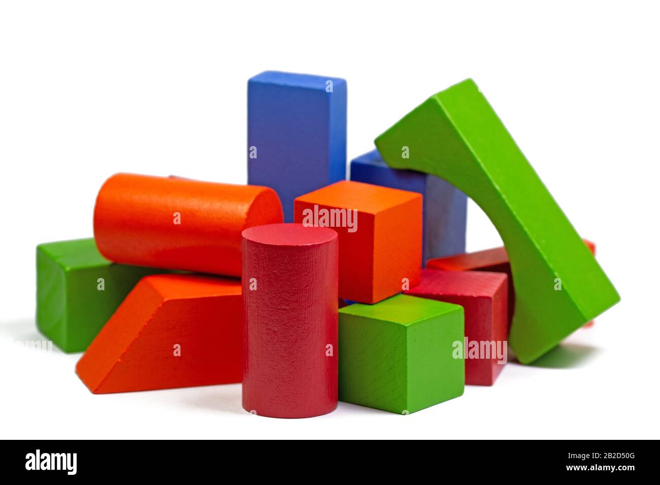 Colorful wooden toy blocks against white background Stock Photo - Alamy