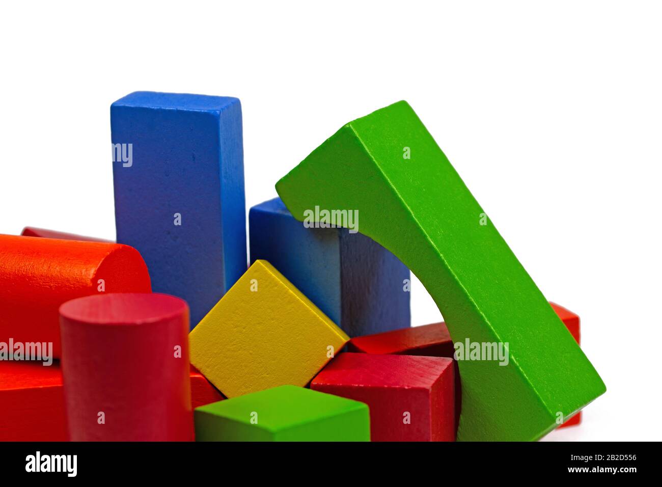 Colorful wooden toy blocks against white background Stock Photo - Alamy