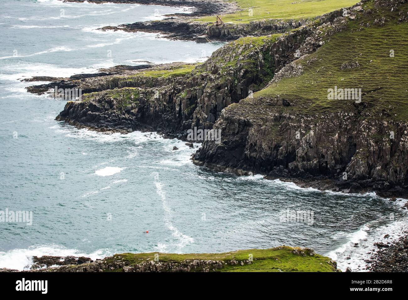 Waves breaking on coastal cliffs of Scotland Stock Photo - Alamy