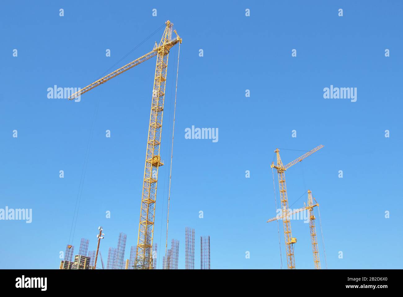Industrial construction cranes the construction of an building Stock ...