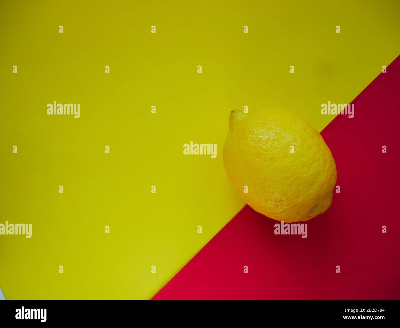 Lemon on a colored background, top view. Trendy colorful photo. Minimal ...