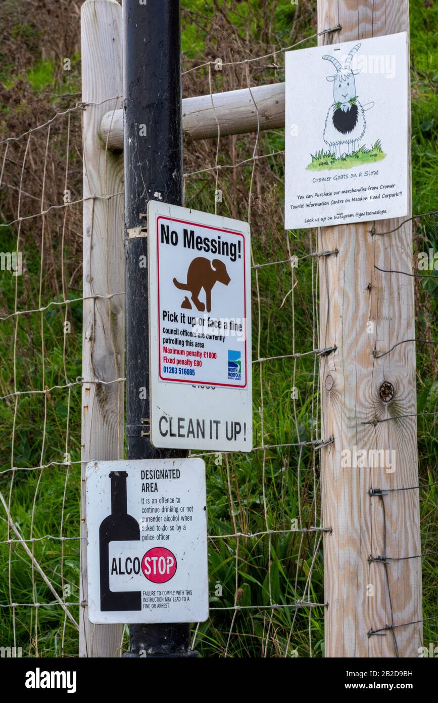 Warning and prohibition signage and signs at the beach in Cromer, north ...