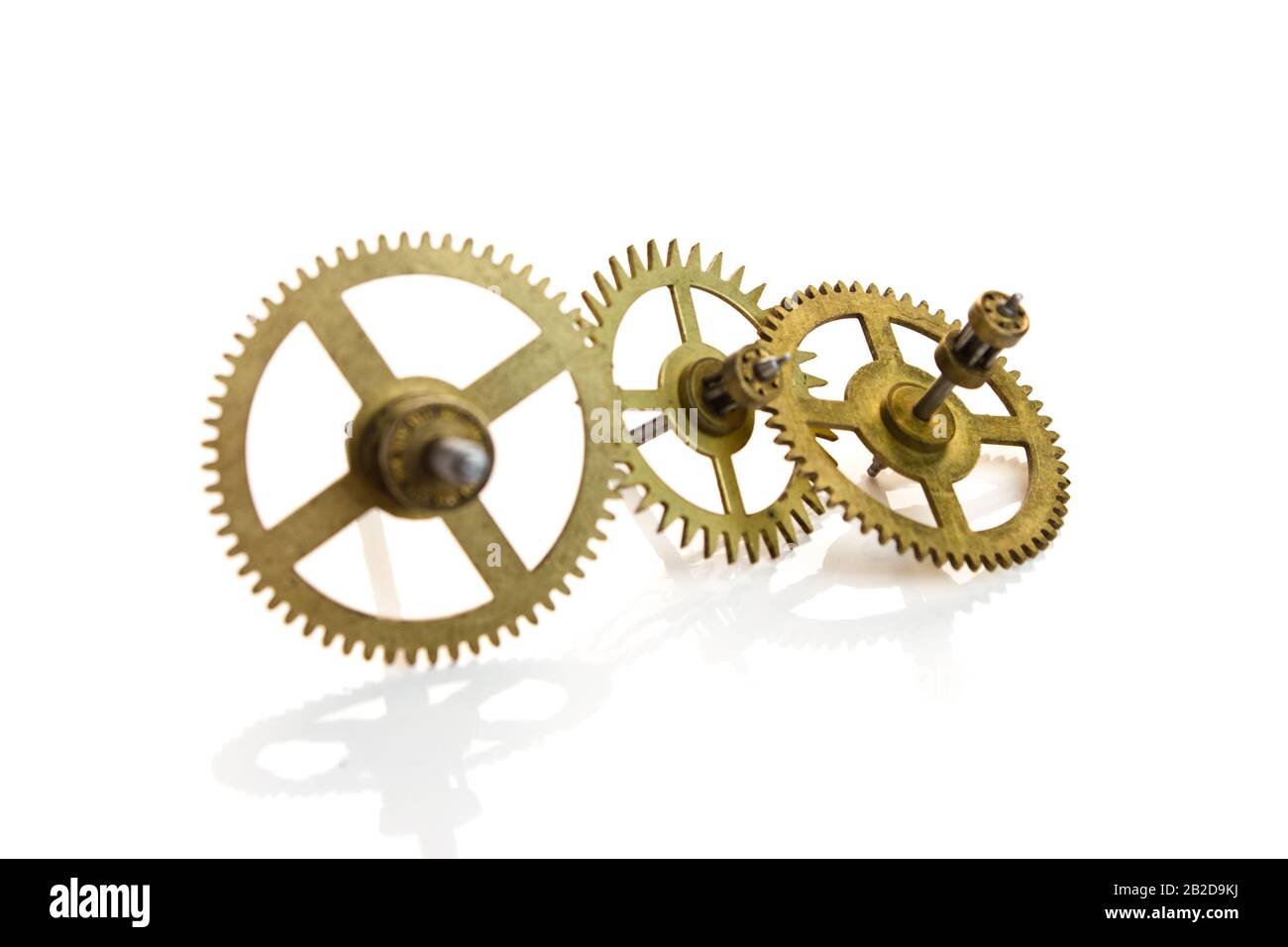clockwork gears isolated on white background Stock Photo - Alamy