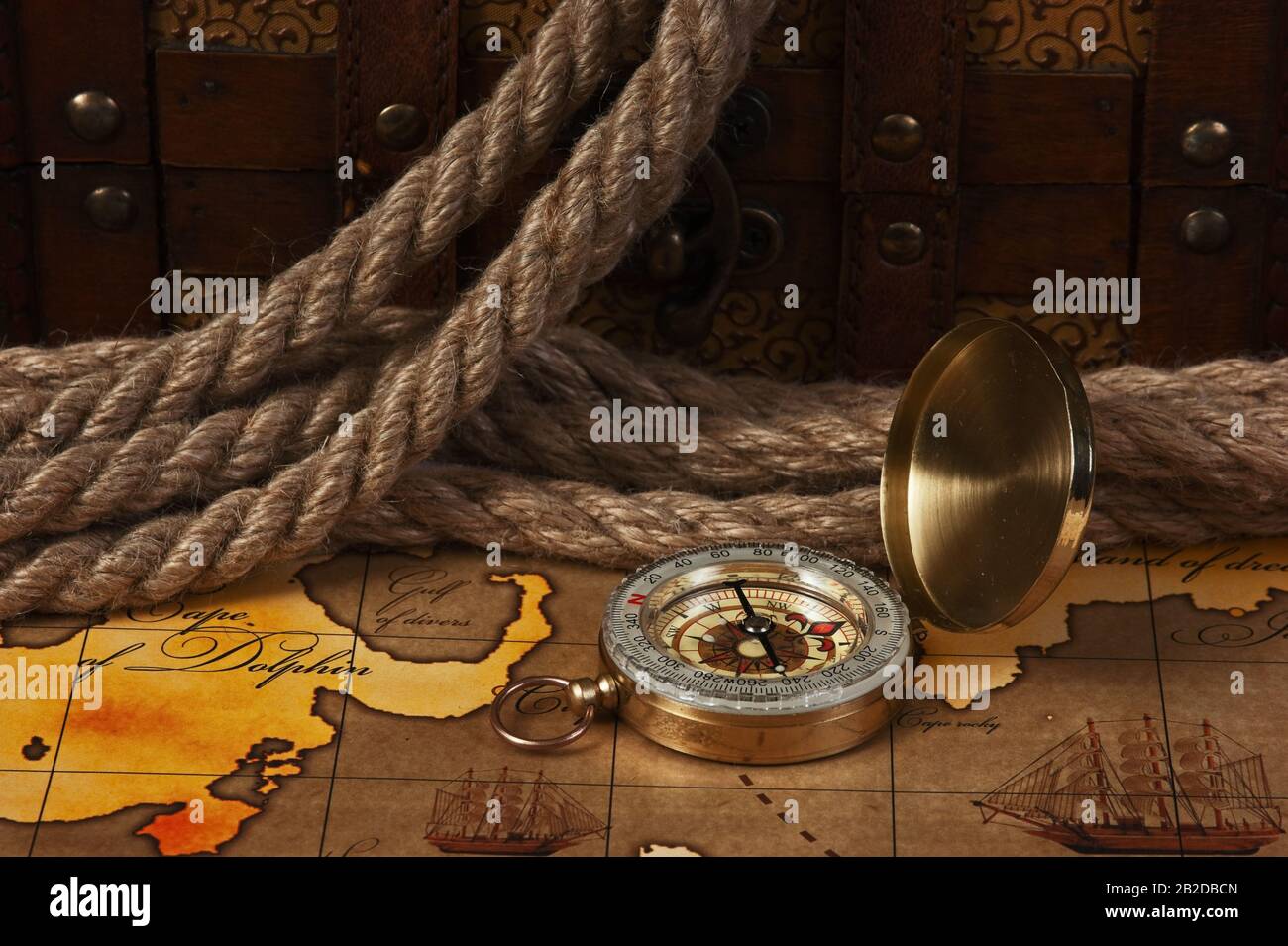 compass and rope on a map Stock Photo - Alamy