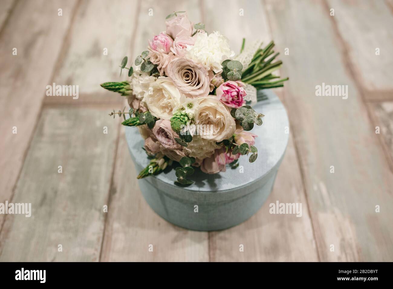 Beautiful bridal bouquet of powder roses. Fashion trend in the wedding ...