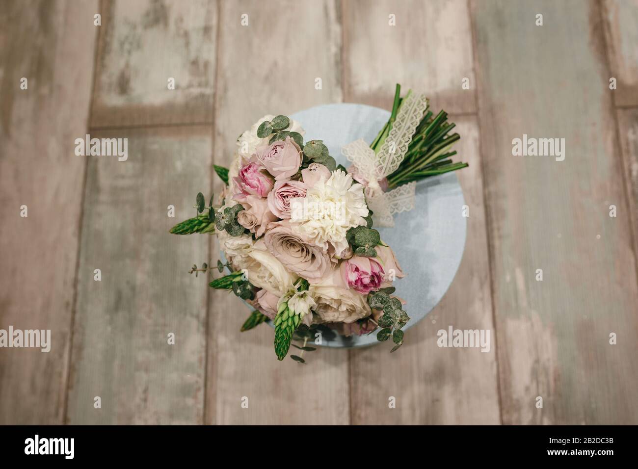 Beautiful bridal bouquet of powder roses. Fashion trend in the wedding ...