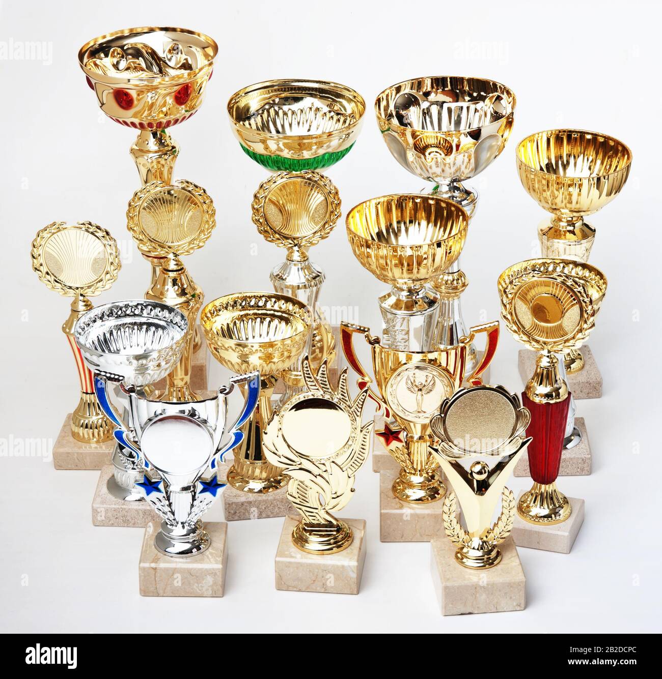many sports awards on a white background Stock Photo - Alamy