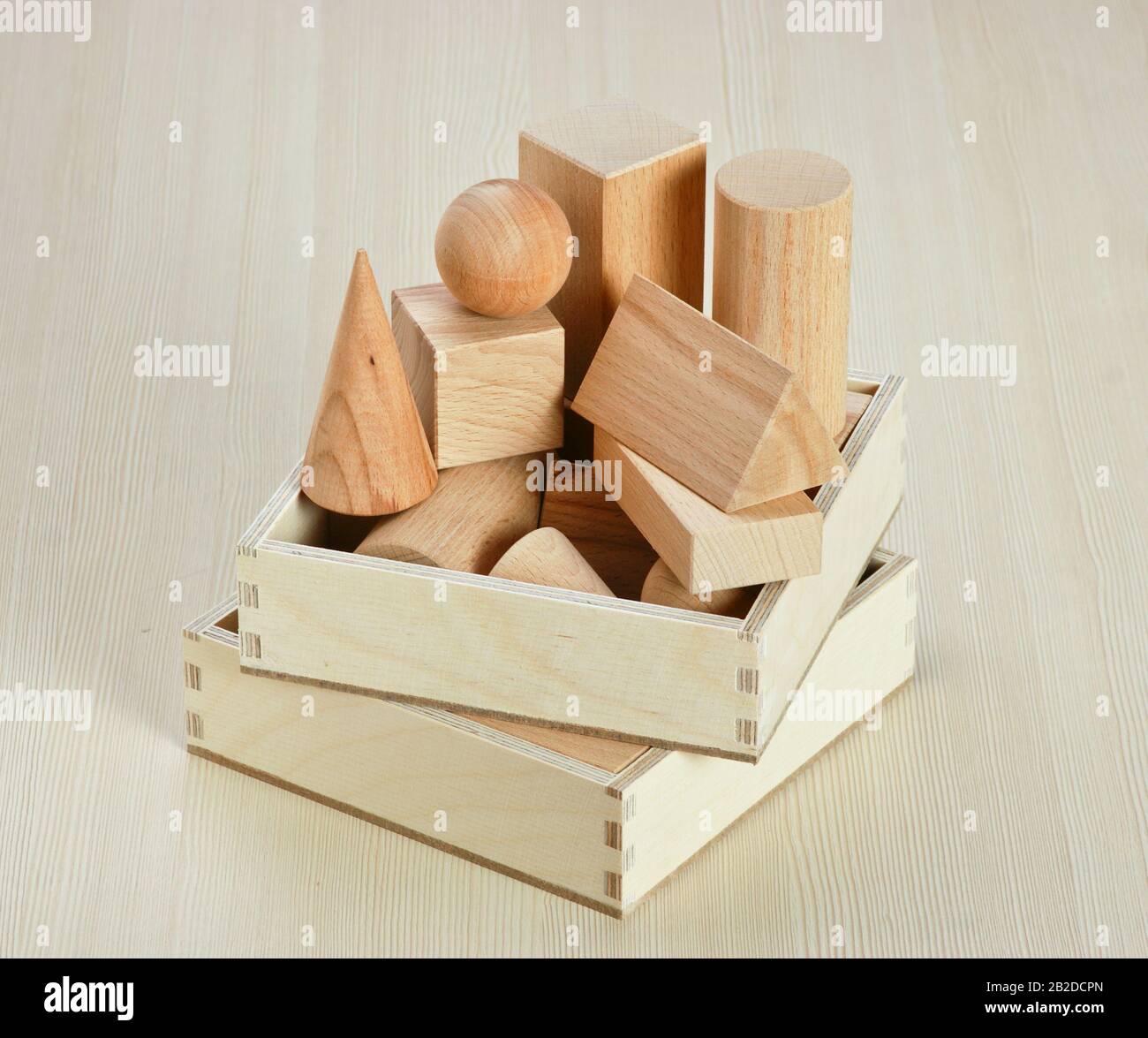 wooden geometric shapes on the table Stock Photo - Alamy