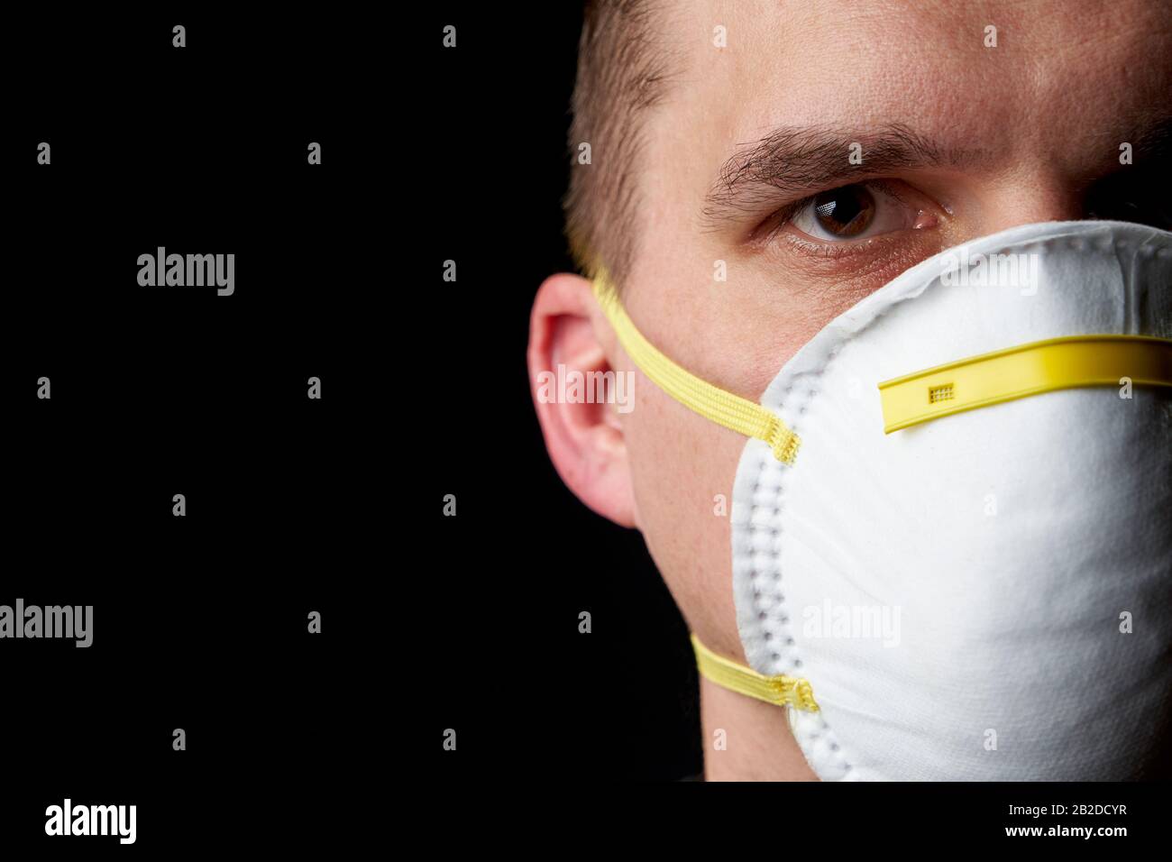 Wearing a dark mask hi-res stock photography and images - Alamy