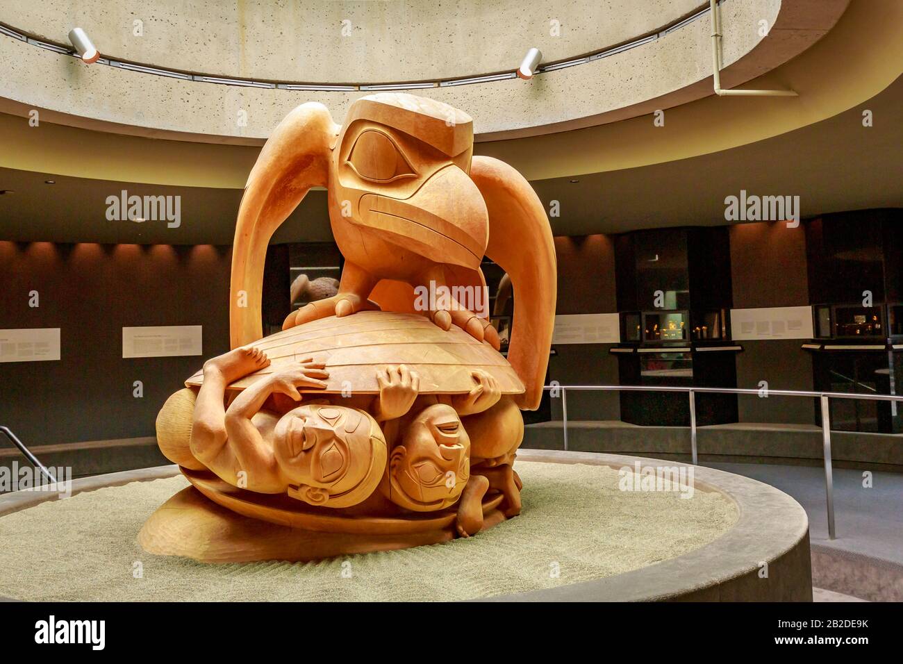 The yellow cedar sculpture The Raven and the First Men by Bill Reid, in ...