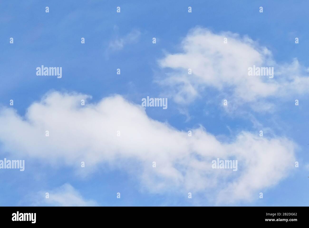 Blue sky with light clouds. Without the sun Stock Photo - Alamy