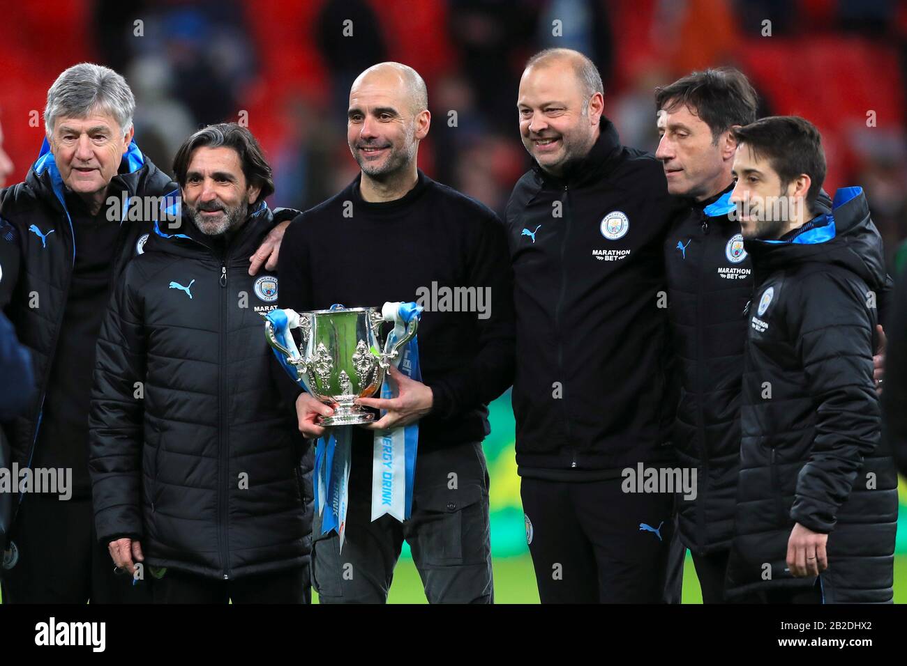 (left to right) Assistant Coach Brian Kidd, Fitness Coach Lorenzo ...