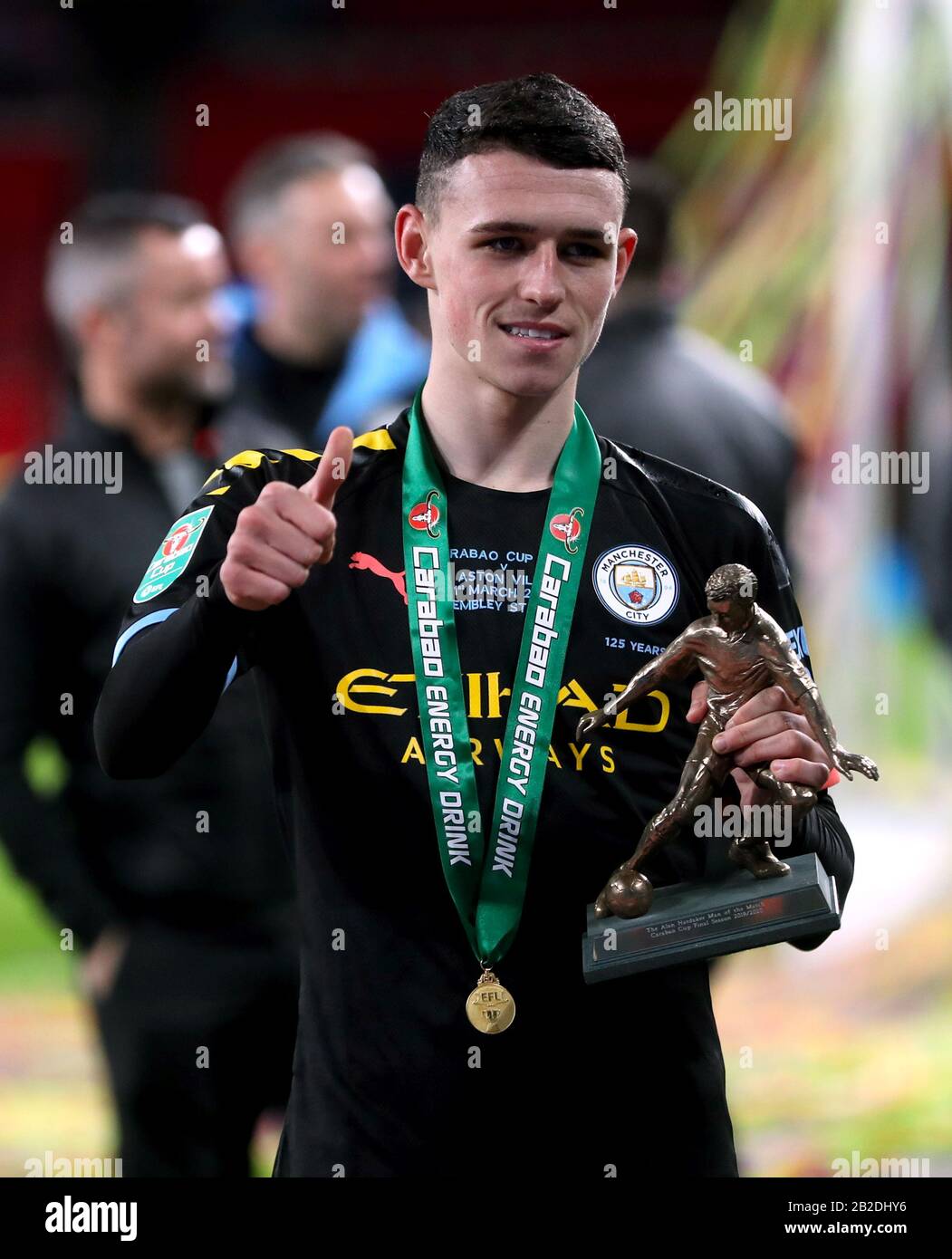 Manchester City's Phil Foden with his man of the match trophy after his ...