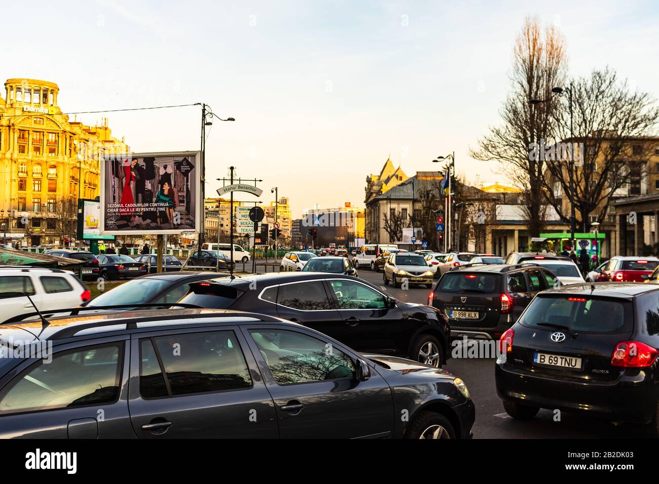 Car traffic at rush hour in downtown area of the city. Car pollution ...