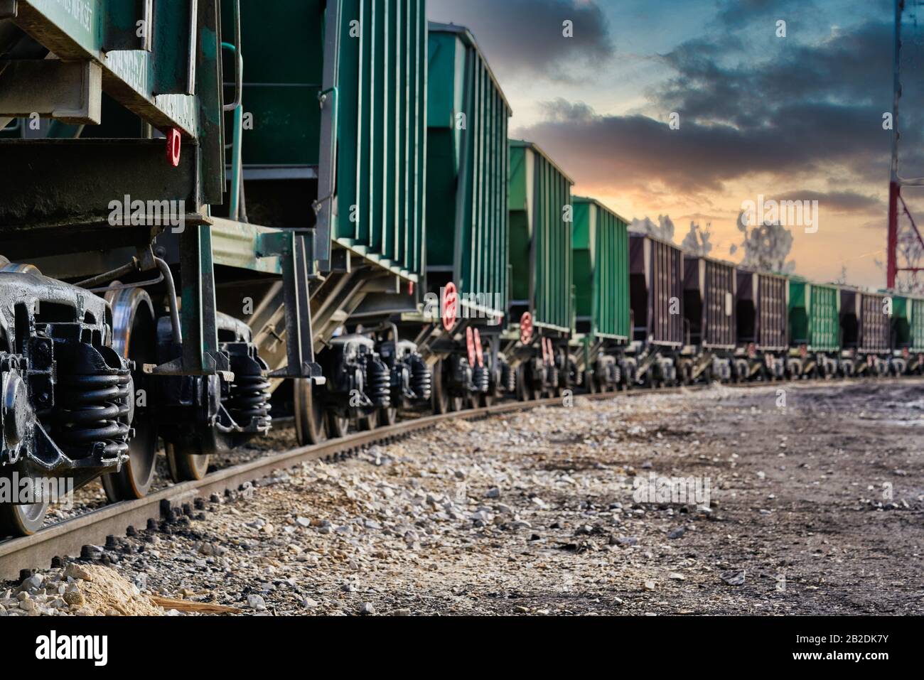 The freight train passes by the station. Wagons with goods delivery ...