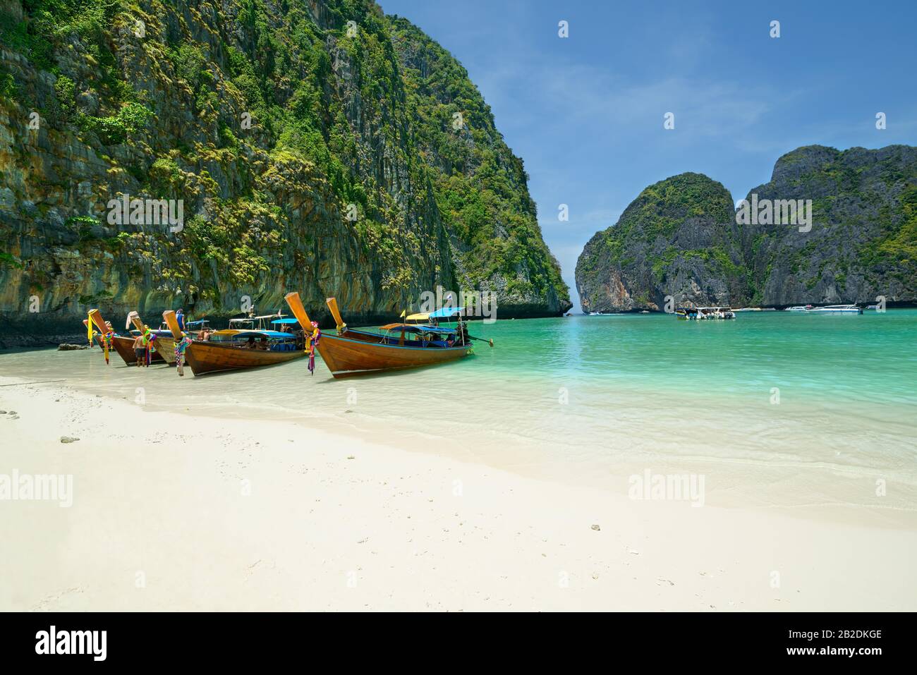 Maya bay, Phi Phi Leh island. The beach with traditional longtail boats ...