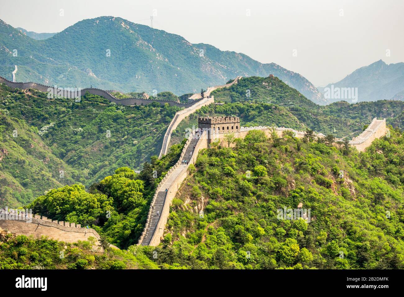 Panorama of Great Wall of China among the green hills and mountains ...