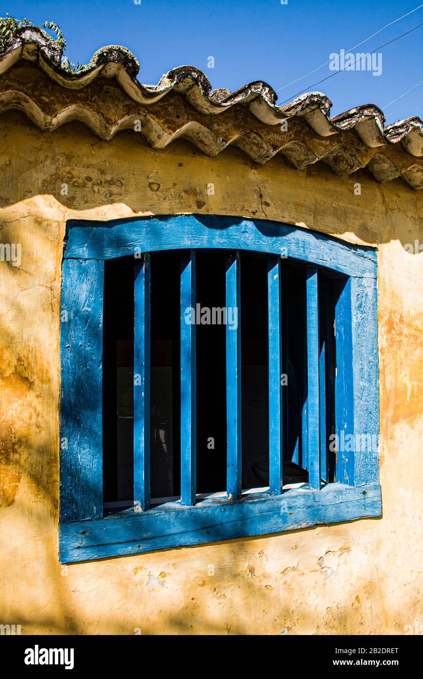 Window with bars in colonial architecture house. Laguna, Santa Catarina ...