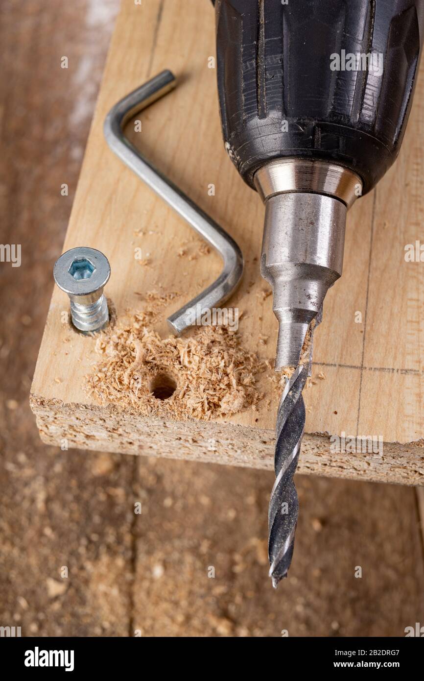 Tools and screws used in carpentry. Small carpentry work in the ...