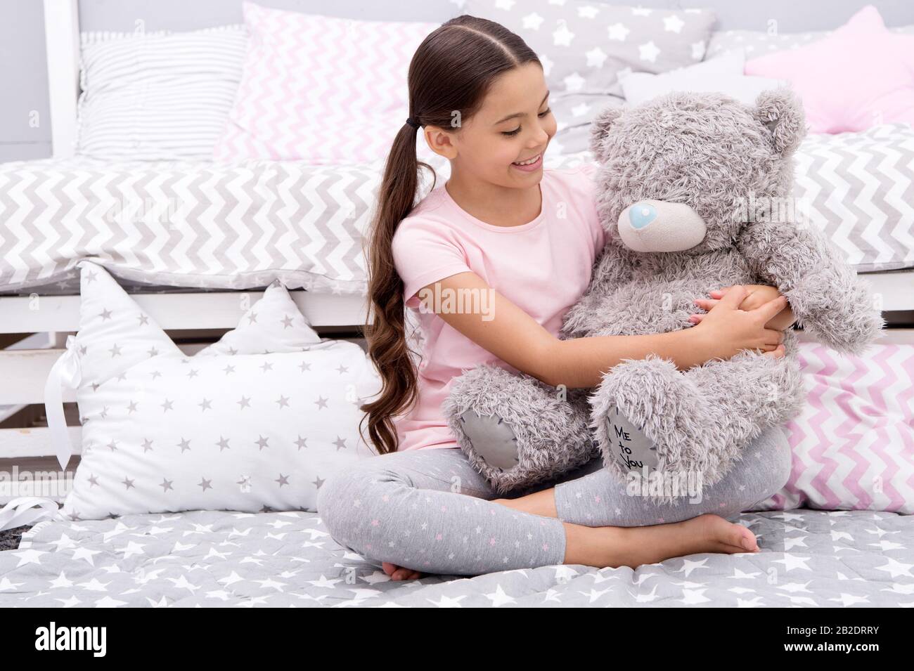 Free hugs. Happy kid cuddle teddy bear. Small kid enjoy playing with ...
