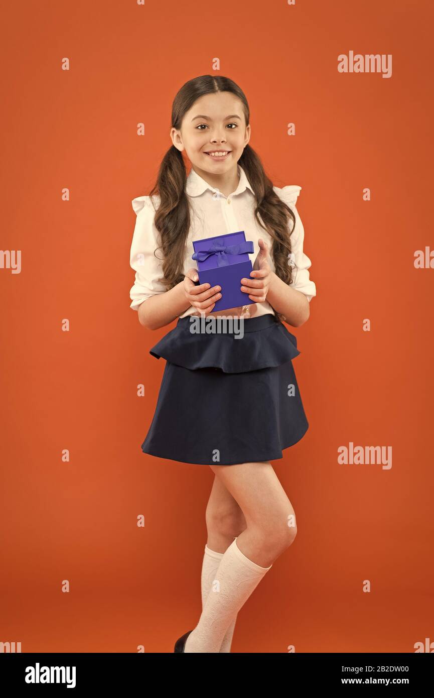 Knowledge day. Schoolgirl surprise gift. Holiday celebration. Rewarding ...