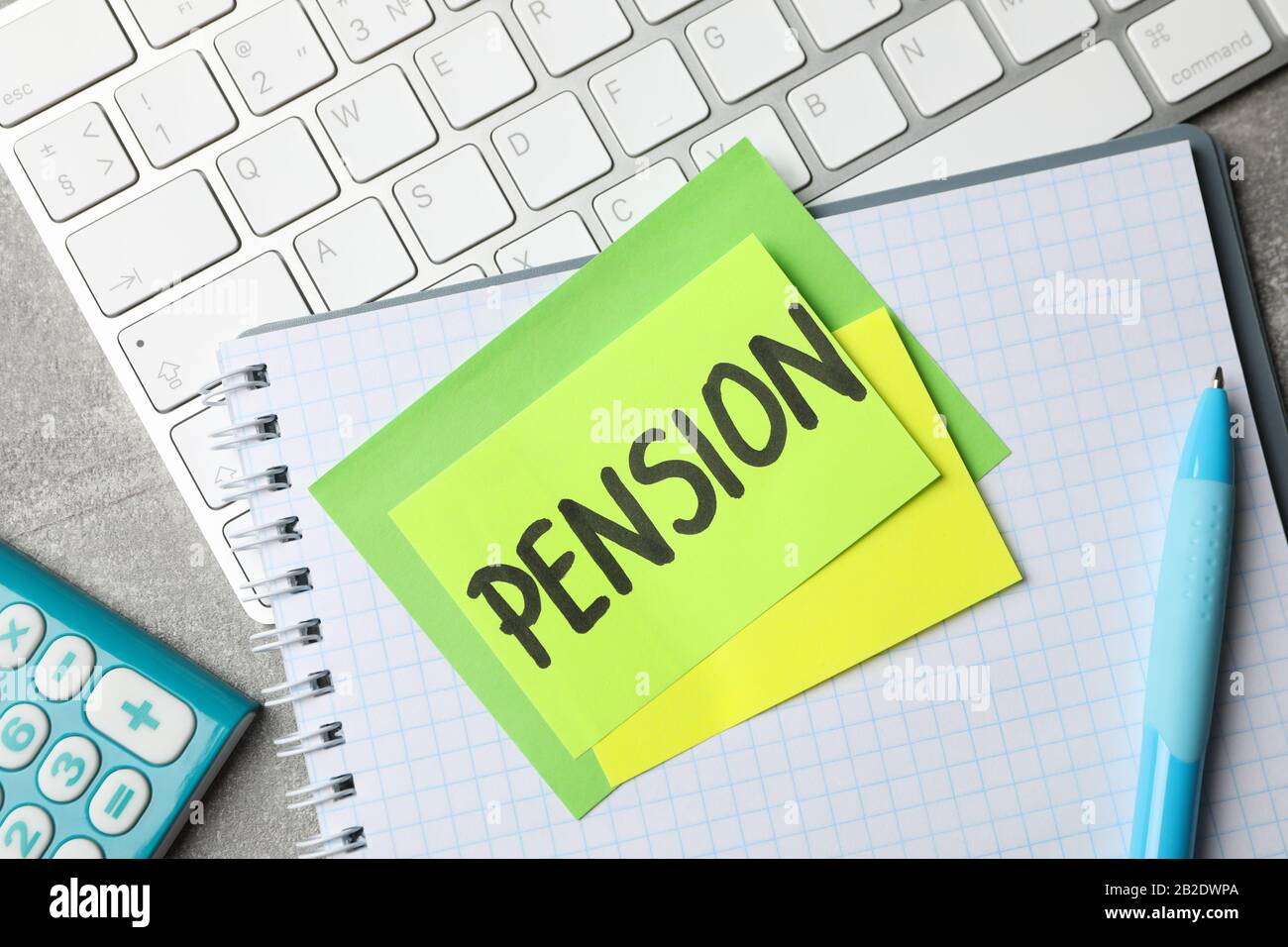 Stickers with inscription Pension on workplace background, top view ...