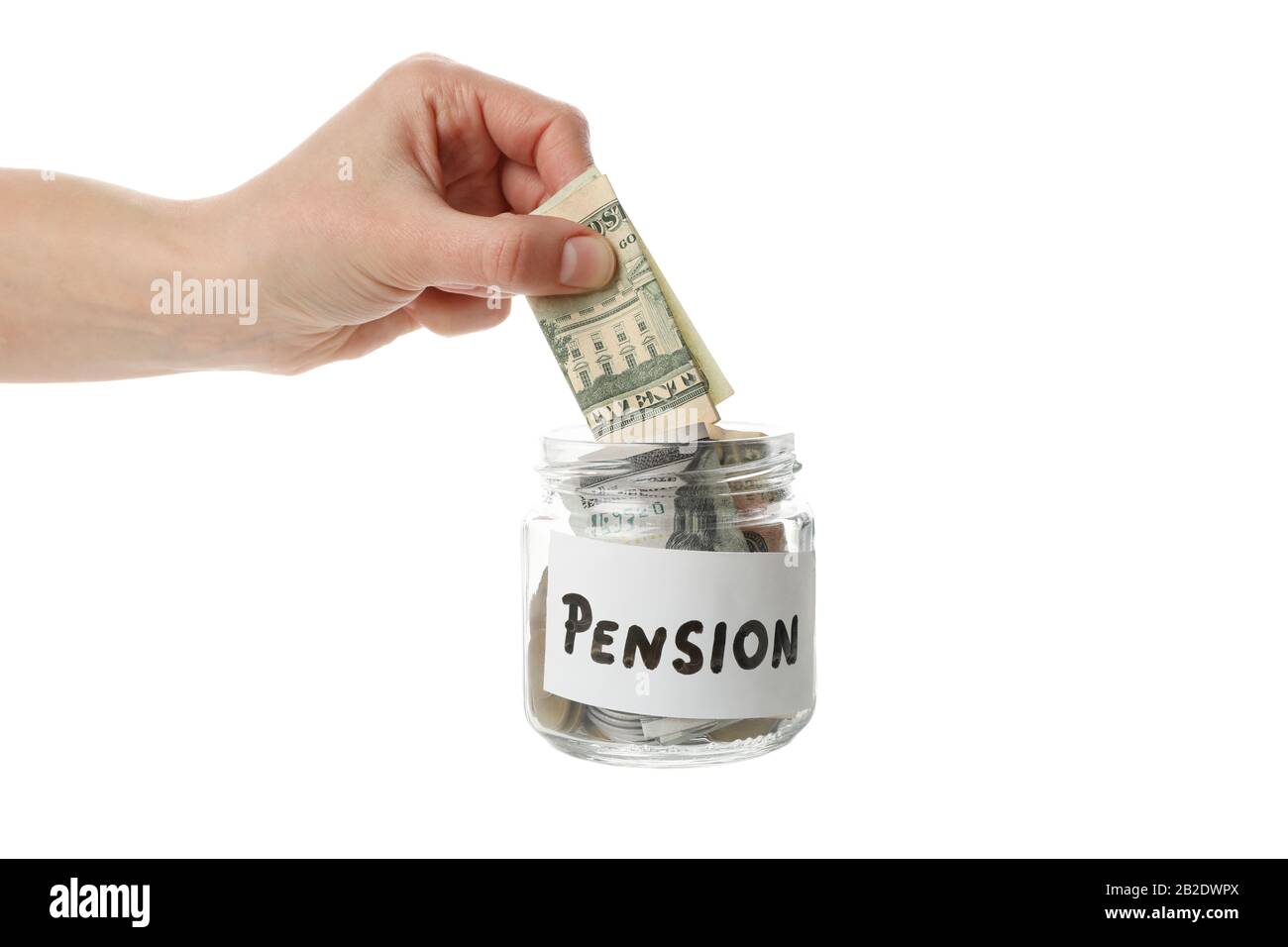 Female hand puts money in jar with money, isolated on white background ...