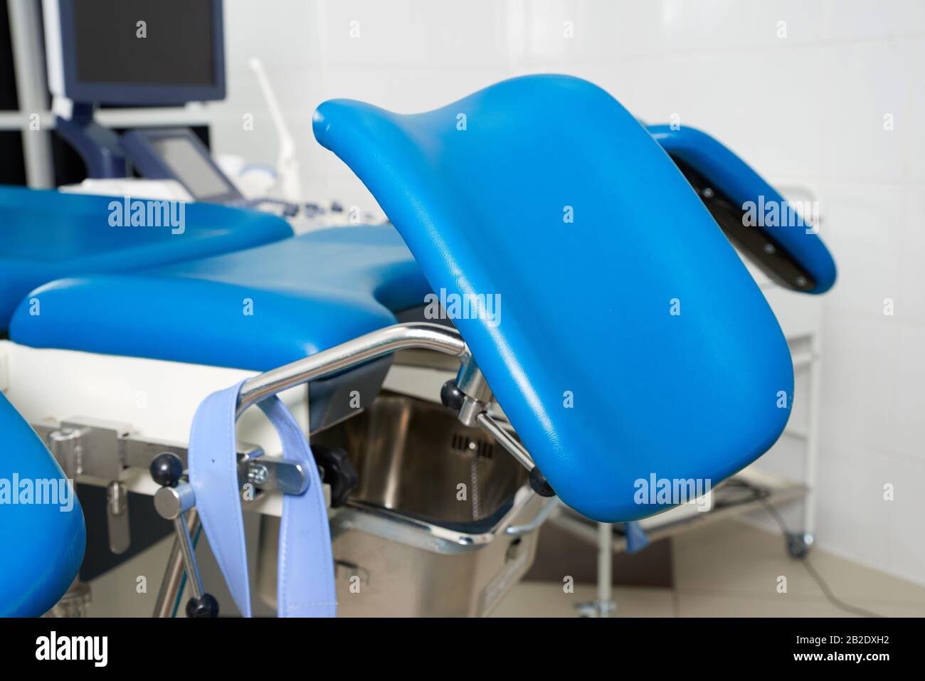 Gynecological room with chair and equipment Stock Photo - Alamy