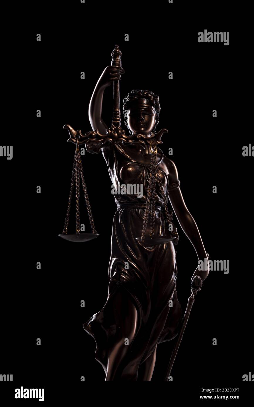 goddess iustitia statue on black background, justice concept Stock ...