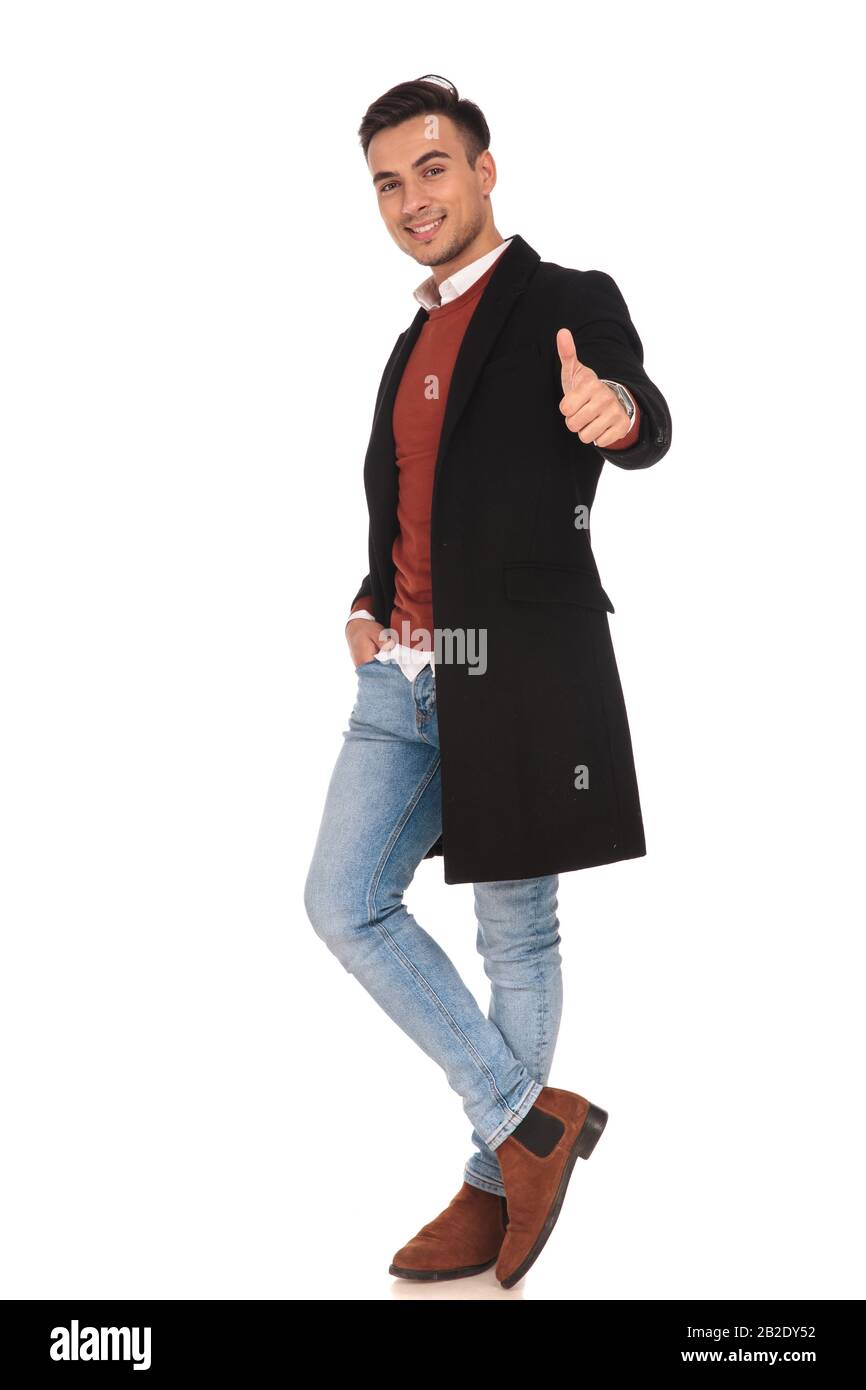 young smart casual man making the ok hand sign on white background ...