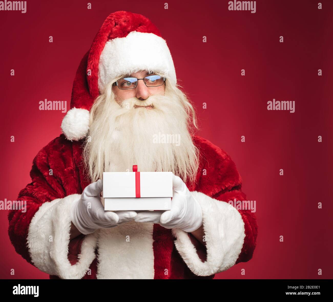 Side view santa claus holding hi-res stock photography and images - Alamy