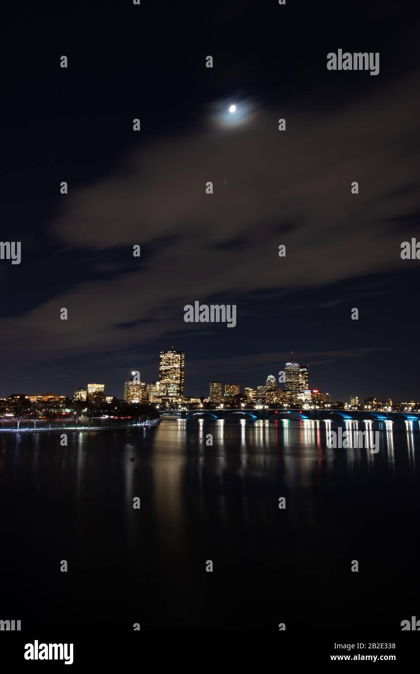 night cityscape of the boston skyline with the moon Stock Photo - Alamy