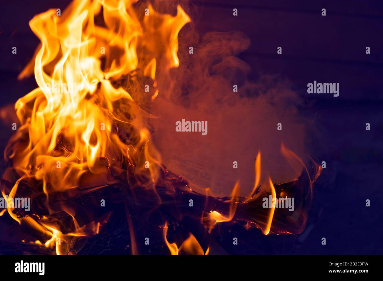 Burning pages of books. Books on fire. Background from burning books ...